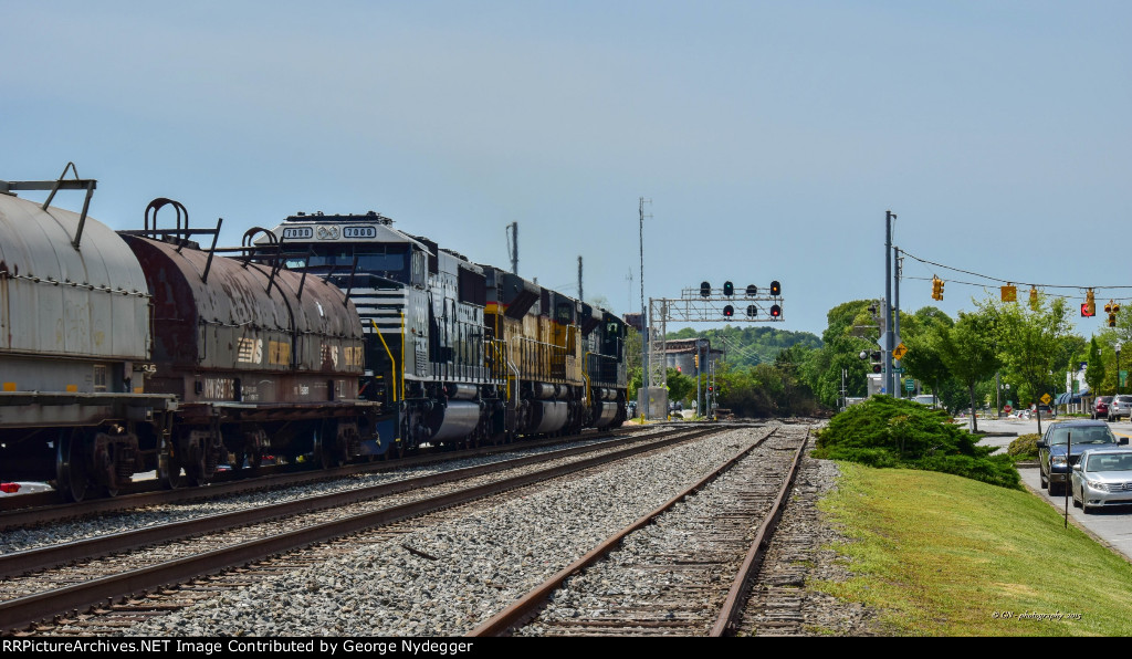 NS 7000 / SD60E is the 3rd engine in this consist with all EMD power.